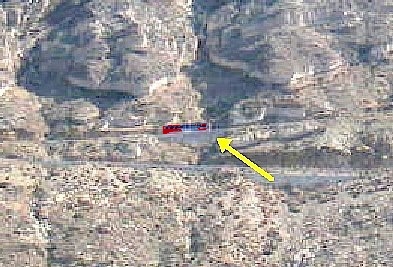 Photo 040... Bus on a cliff wall